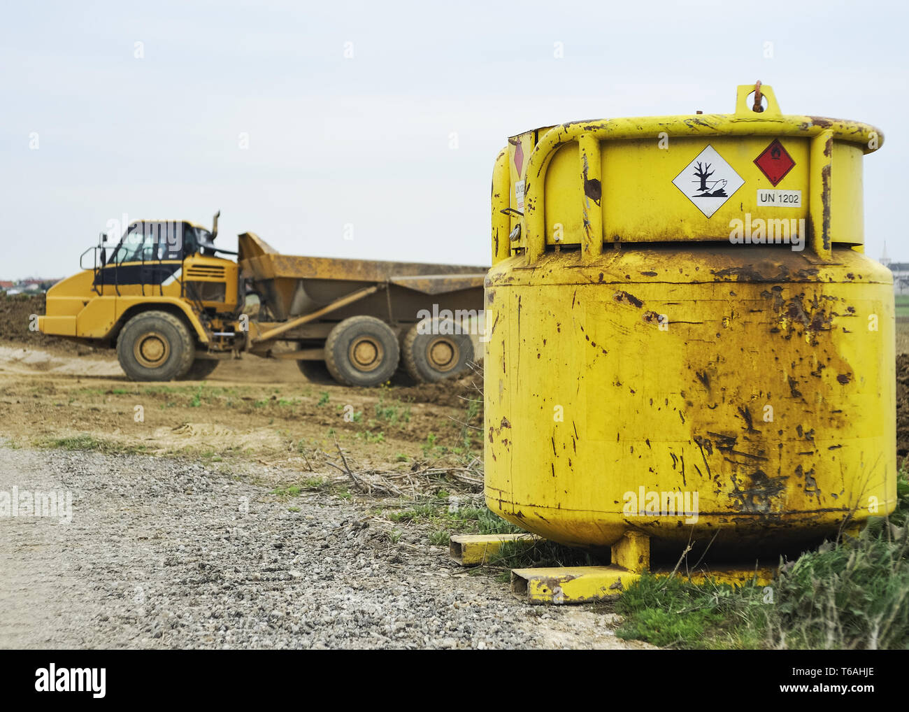 Yellow tank with diesel on a construction site Stock Photo - Alamy