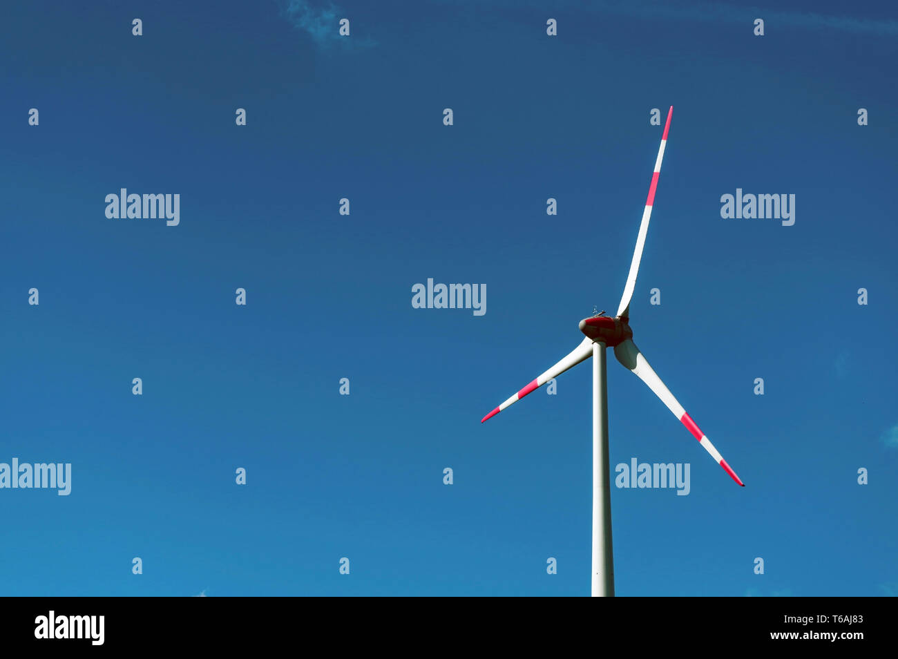 blue sky with Wind turbines generating electricity Stock Photo - Alamy