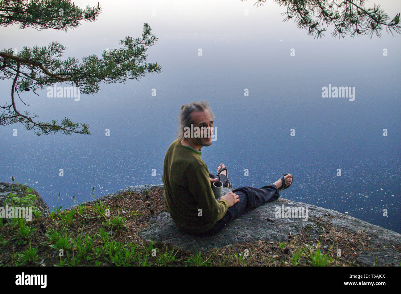 Sitting on a slope hi-res stock photography and images - Alamy