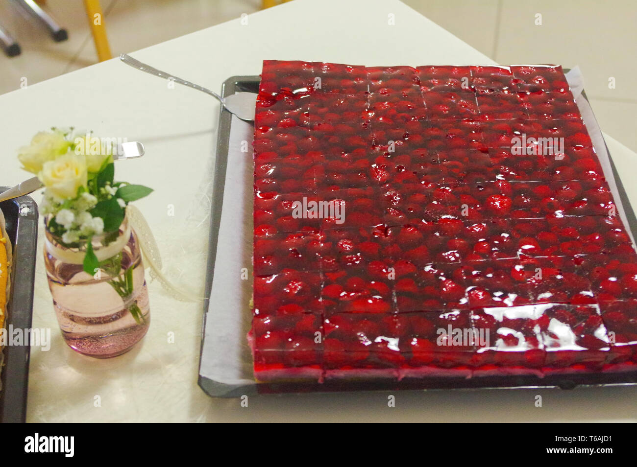 fresh baked raspberry sponge cake in baking tray Stock Photo - Alamy