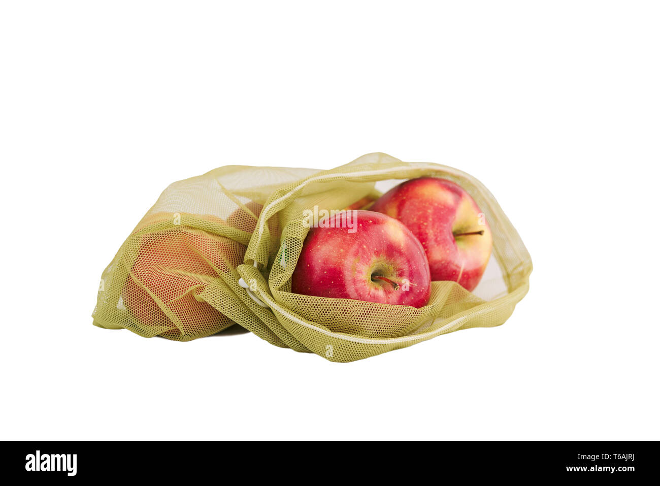 Reusable bag with red apples isolated on white background. Zero waste ...