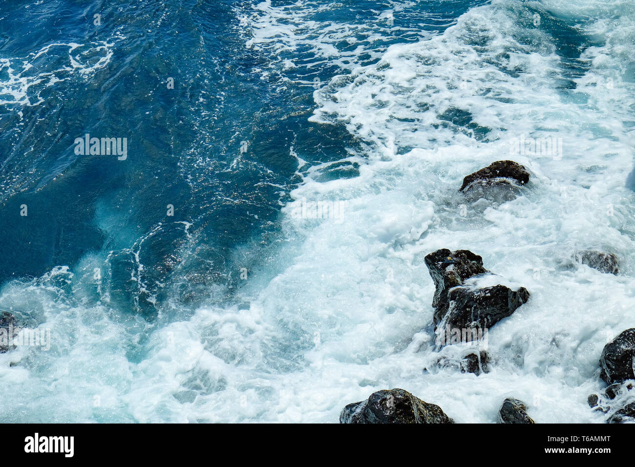 Water, waves and rocks Stock Photo - Alamy