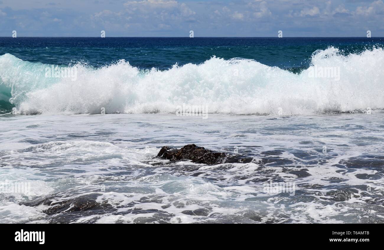 Beautiful splashing turquoise ocean waves at the white beaches on the ...