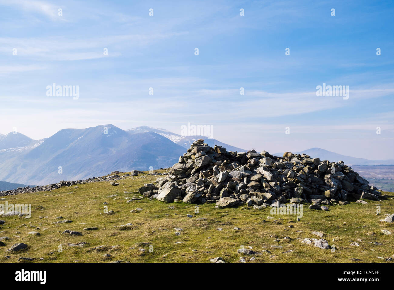 Stone cairn shelter on top of Moel Faban hill in hills of northern ...