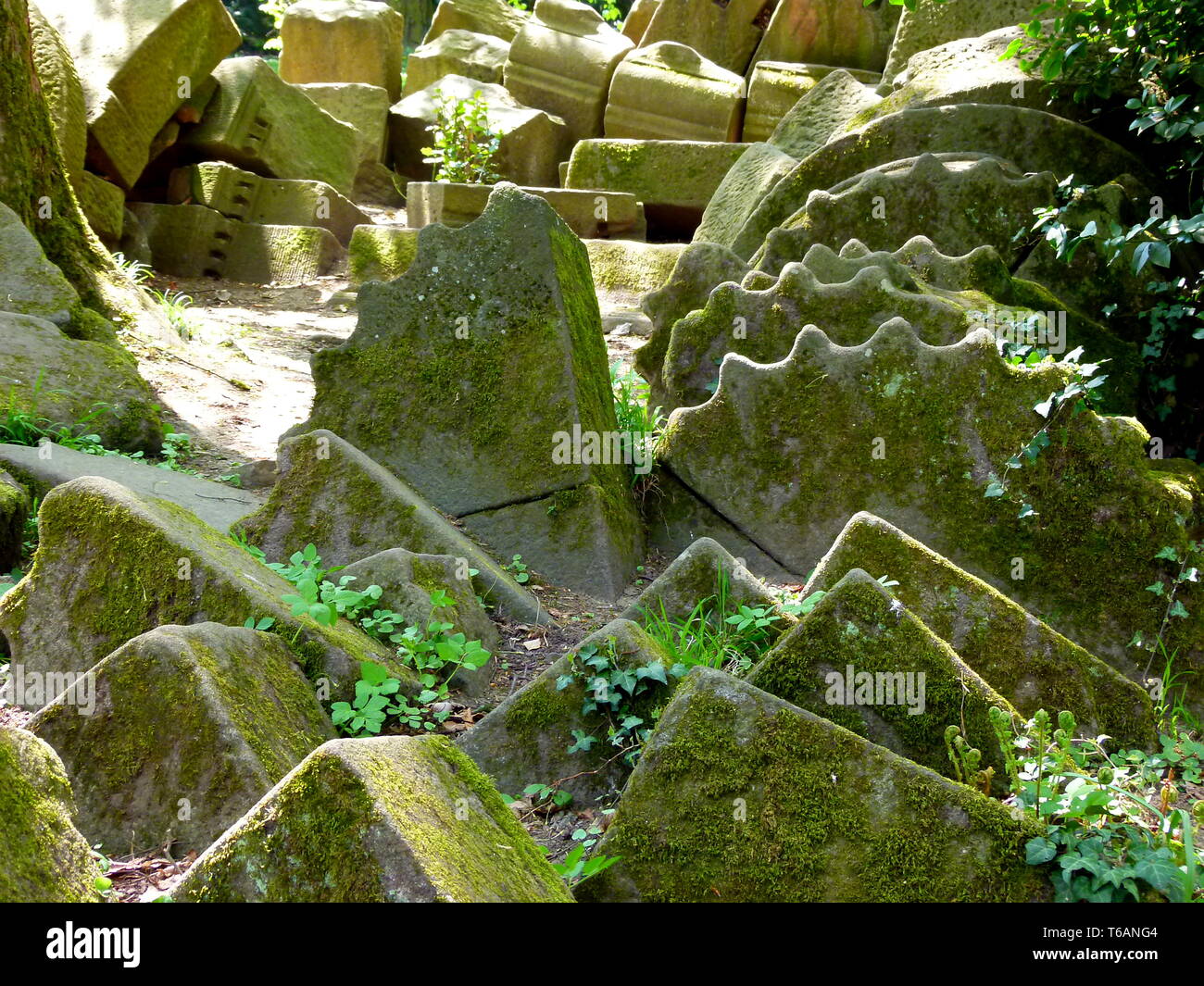 overturned historic stone pillar Stock Photo - Alamy
