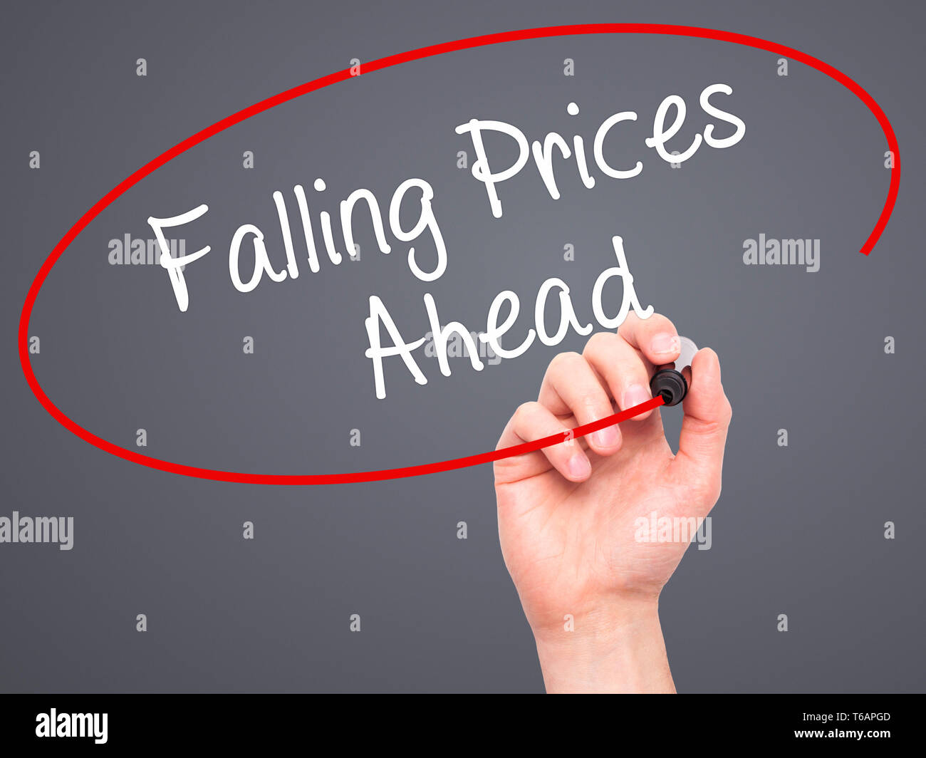 Man Hand writing Falling Prices Ahead with black marker on visual ...