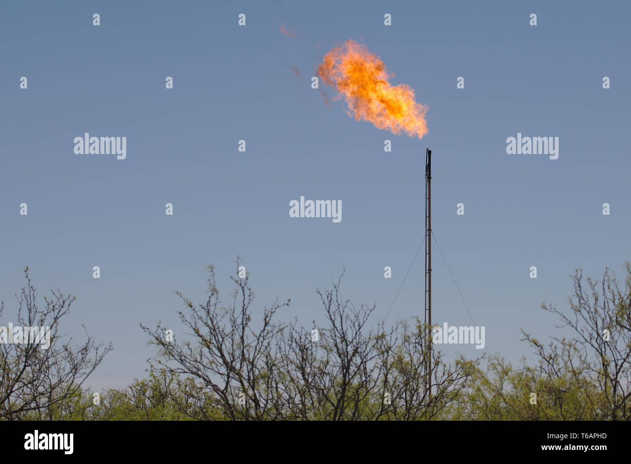 Midland, County / United States - April 21, 2019: Excess natural gas is ...