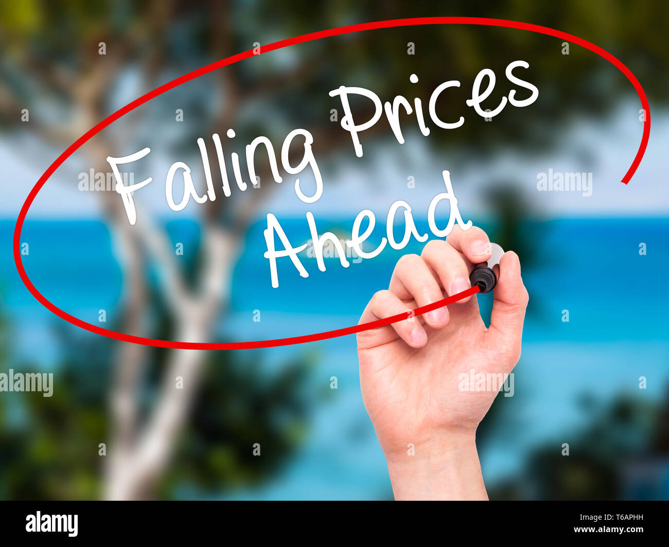 Man Hand writing Falling Prices Ahead with black marker on visual ...