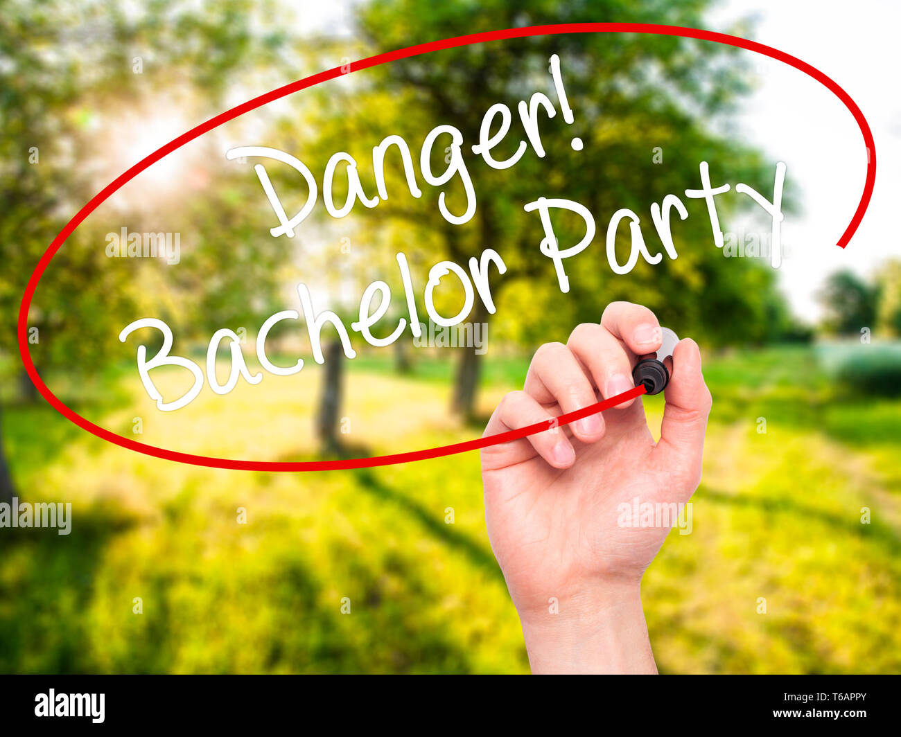Man Hand writing Danger! Bachelor Party with black marker on visual ...