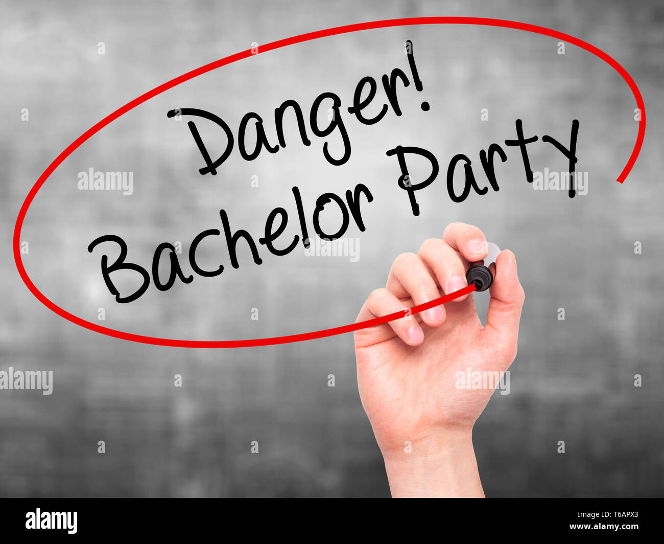 Man Hand writing Danger! Bachelor Party with black marker on visual ...