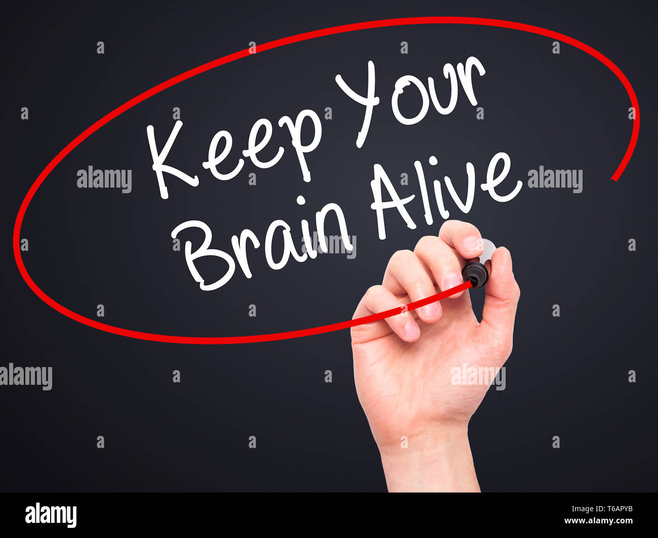 Man Hand writing Keep Your Brain Alive with black marker on visual ...