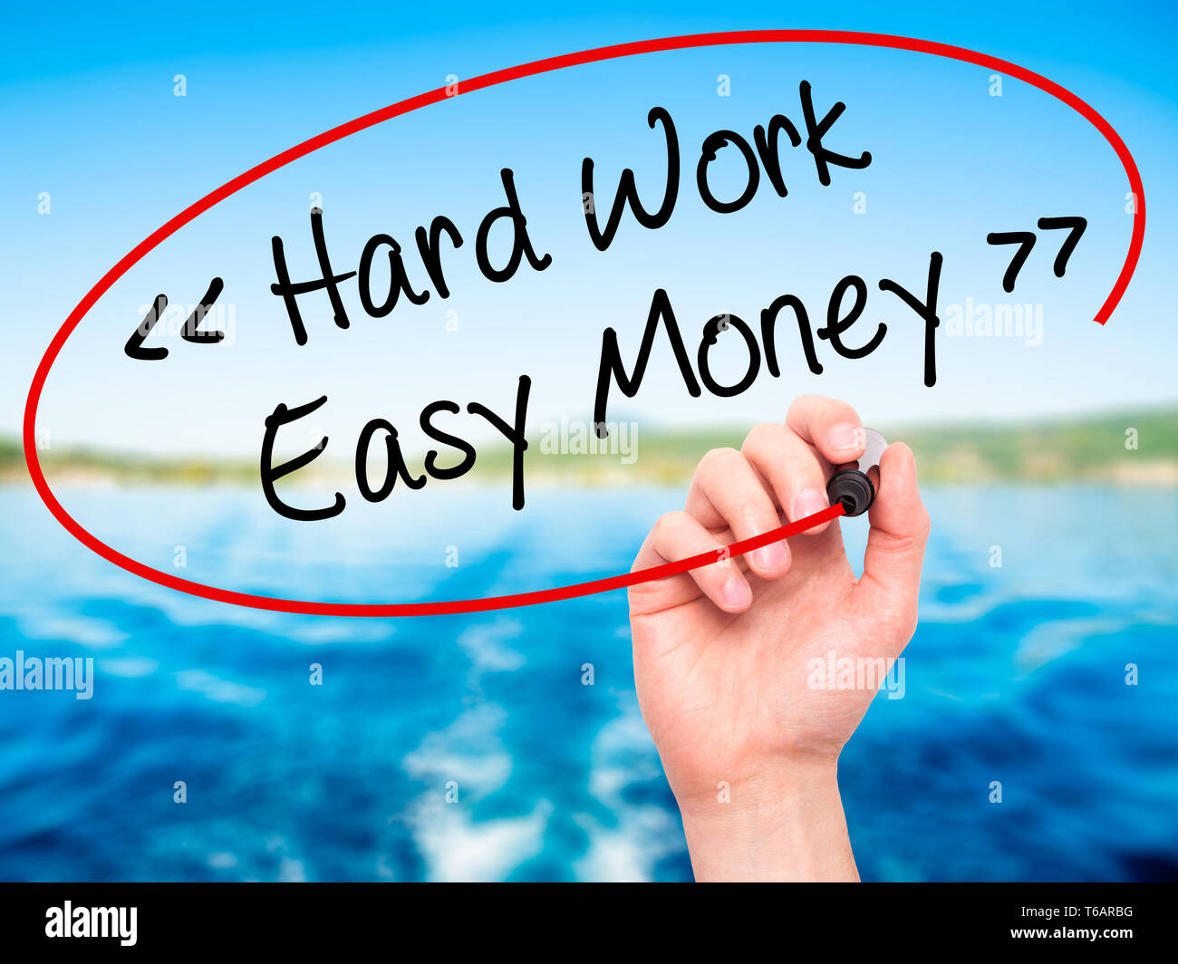 Man Hand writing Hard Work - Easy Money with black marker on visual ...