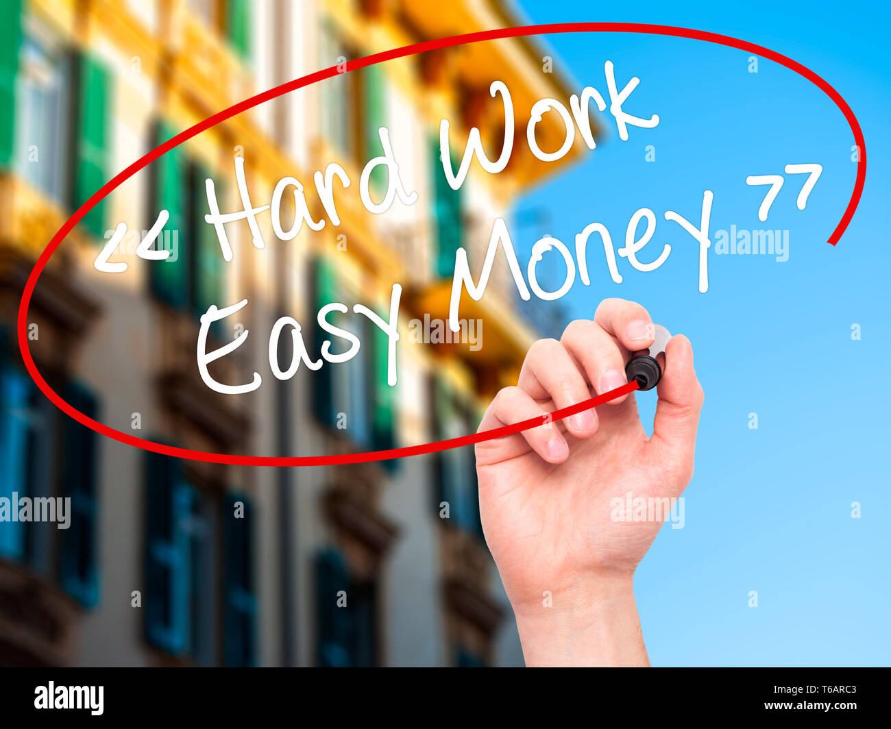 Man Hand writing Hard Work - Easy Money with black marker on visual ...