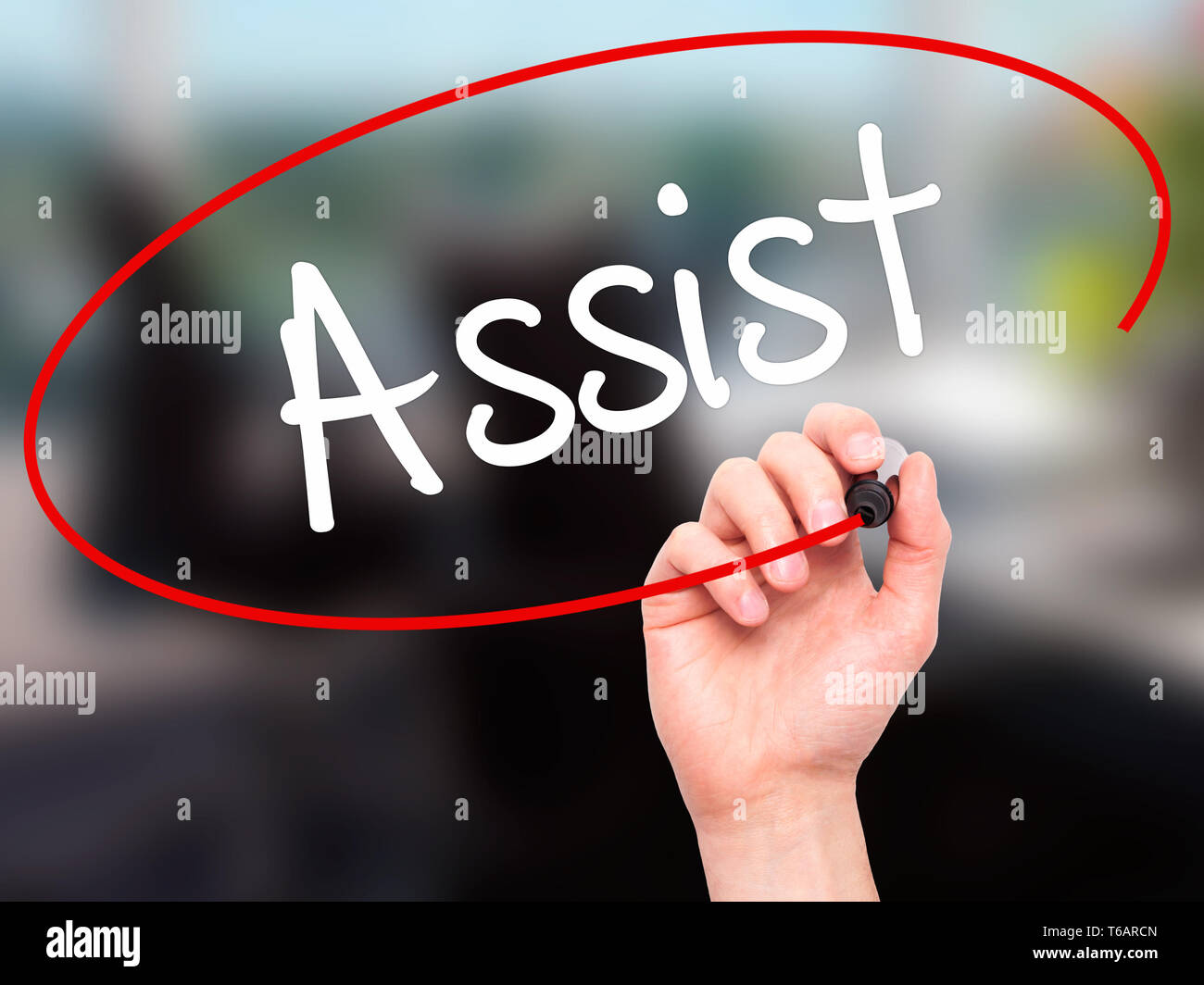 Man Hand writing Assist with black marker on visual screen Stock Photo ...