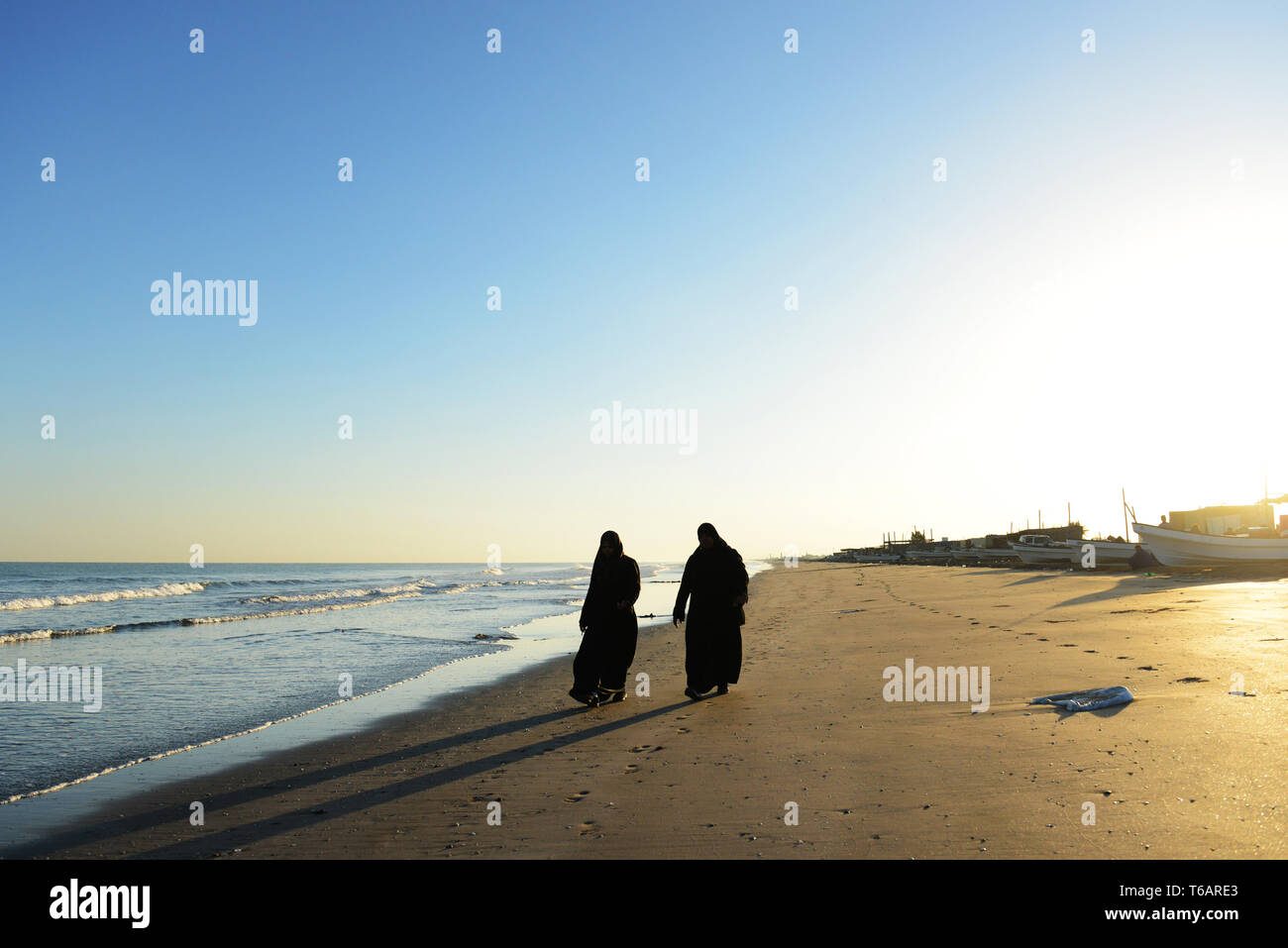 Sunrise over the Barka beach in Oman Stock Photo - Alamy