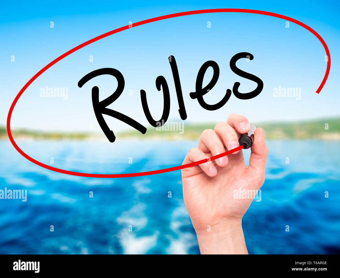 Man Hand writing Rules with black marker on visual screen Stock Photo ...