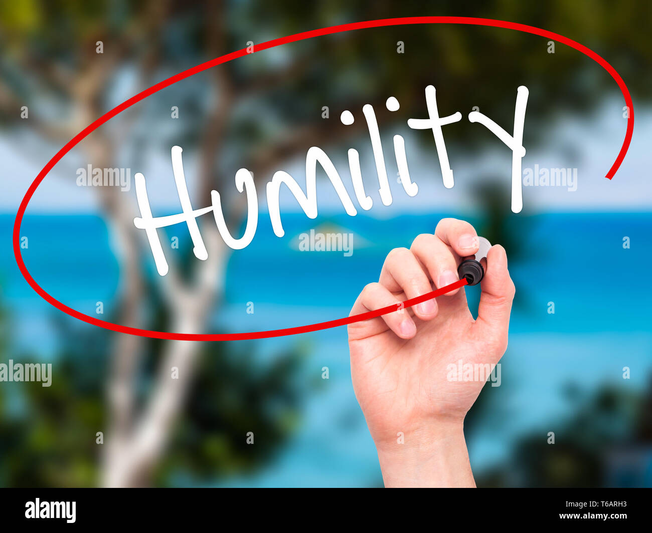 Man Hand writing Humility with black marker on visual screen Stock ...