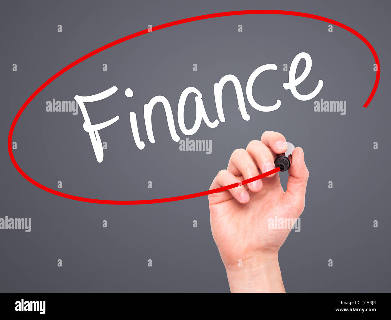 Man Hand writing Finance with black marker on visual screen Stock Photo ...