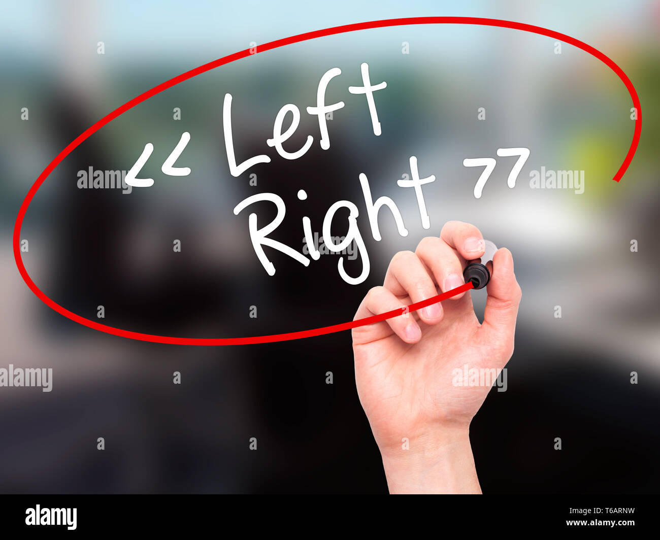 Man Hand writing Left - Right with black marker on visual screen Stock ...