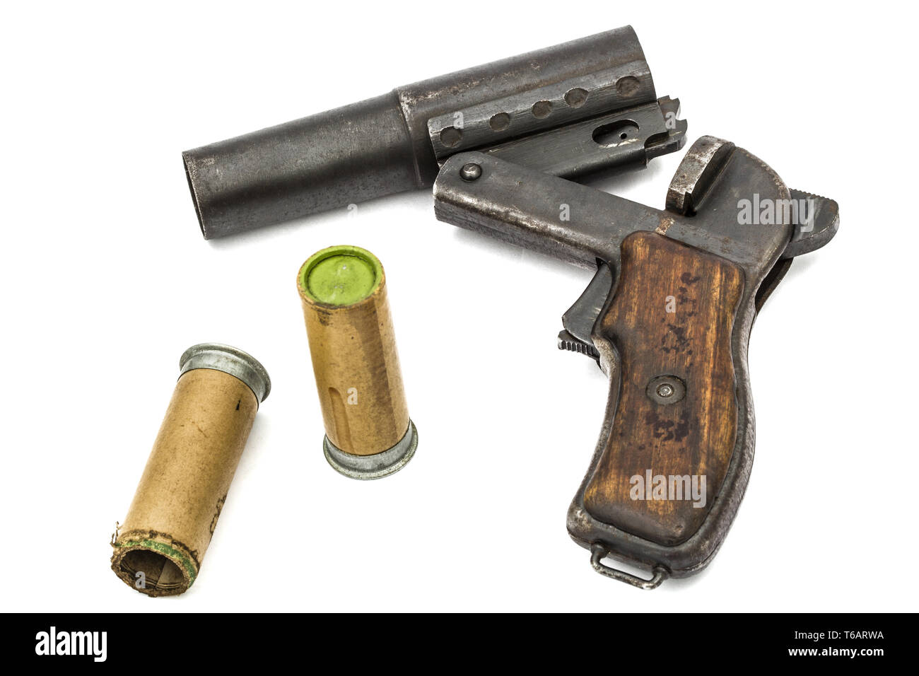 Old signal pistol, flare gun and cartridges, isolated on white ...