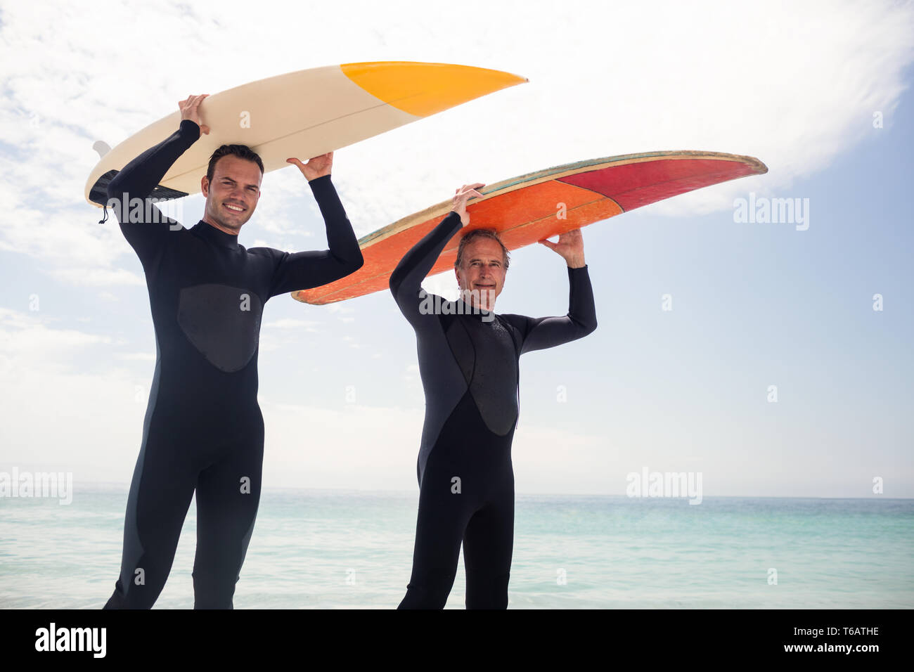 Older father and son surf hi-res stock photography and images - Alamy