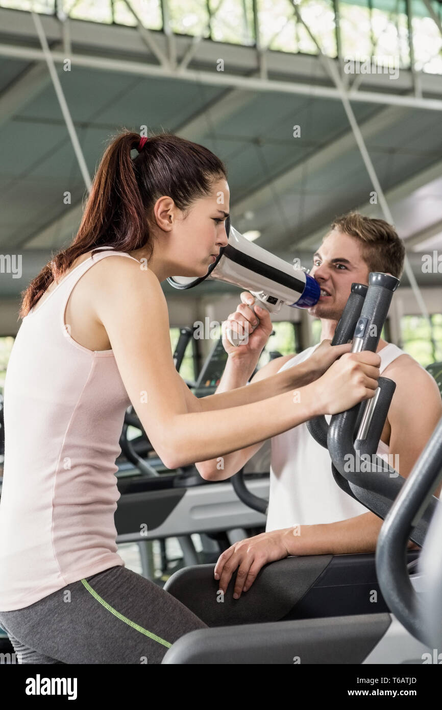 Male fitness coach shouting through hi-res stock photography and images ...