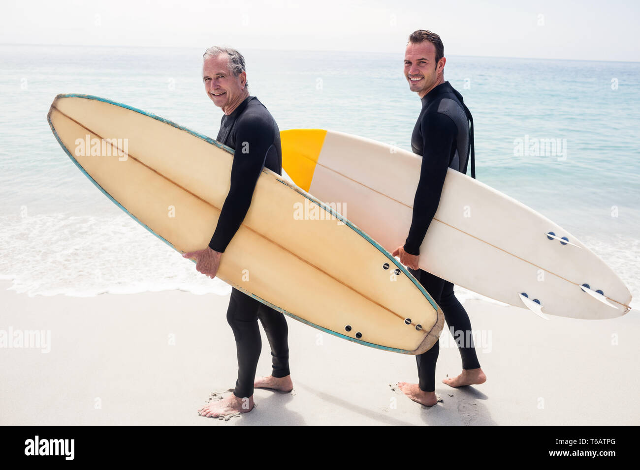 Older father and son surf hi-res stock photography and images - Alamy