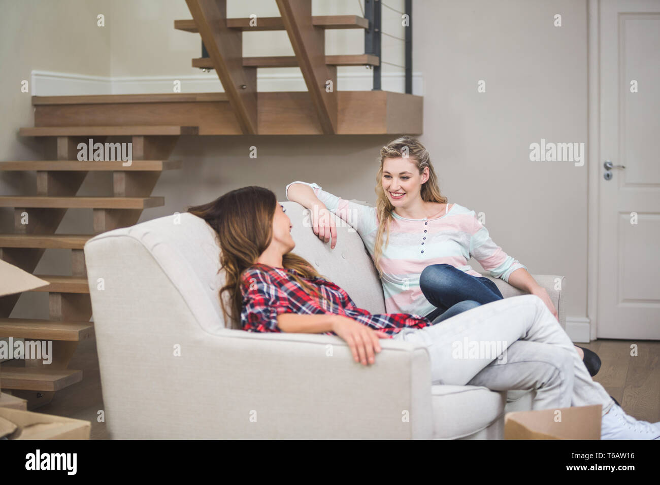 Two women interacting other hi-res stock photography and images - Alamy