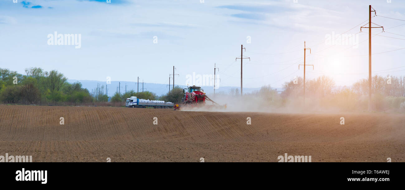 Farmer seeding, sowing crops at field. Sowing is the process of ...