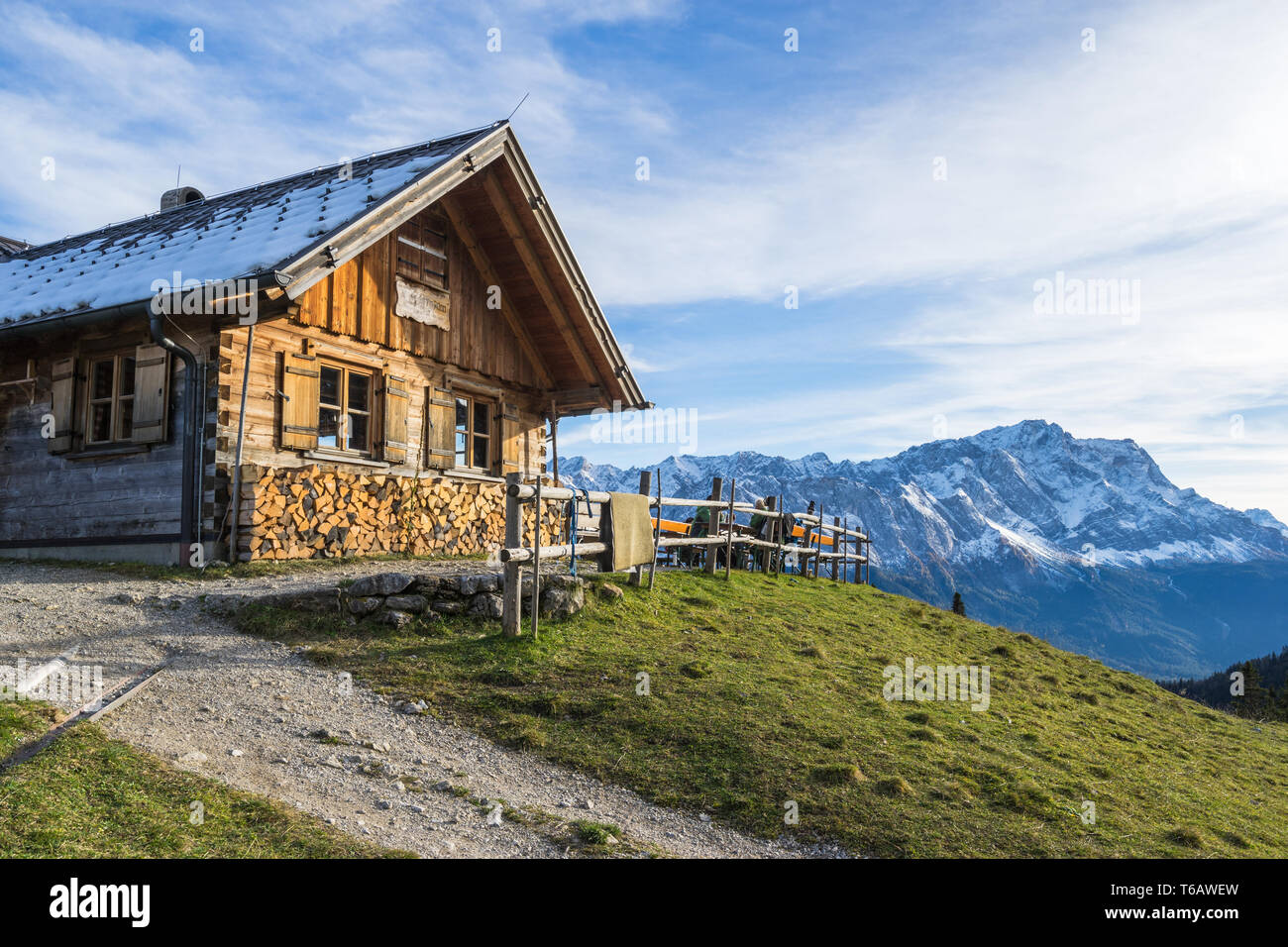 Mountain hut in front of mountain range Stock Photo - Alamy