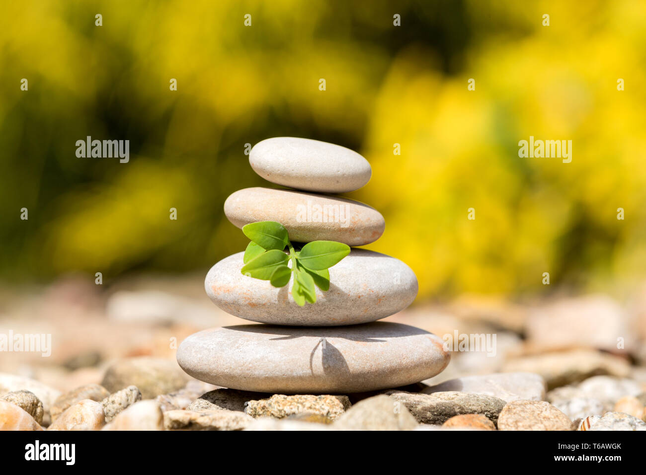 Pile of balancing pebble stones outdoor Stock Photo - Alamy