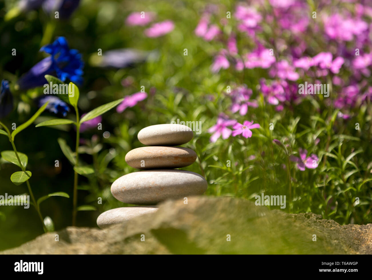 Pile of balancing pebble stones outdoor Stock Photo - Alamy
