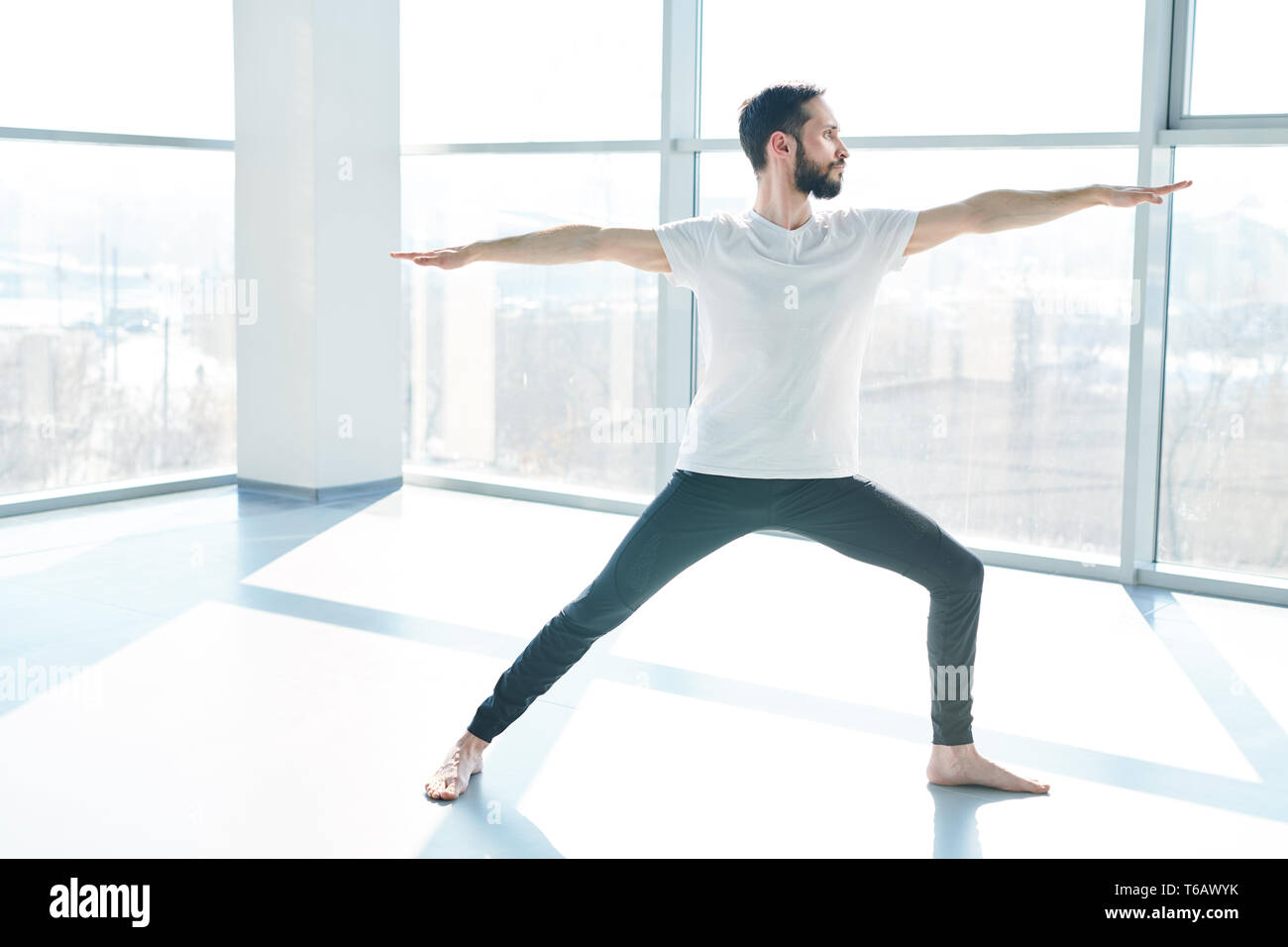 Guy is balancing hi-res stock photography and images - Alamy