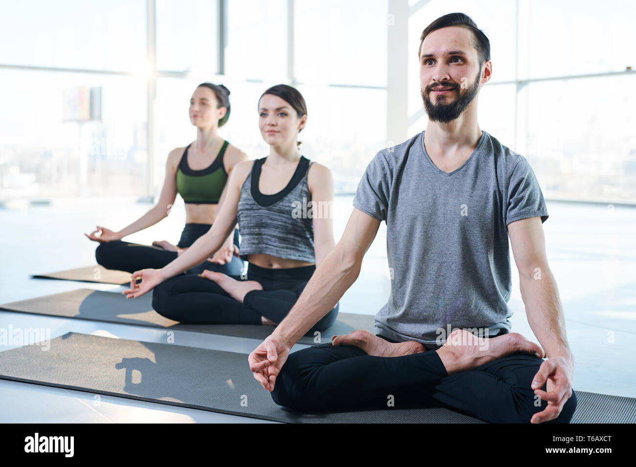 Looking at instructor Stock Photo - Alamy