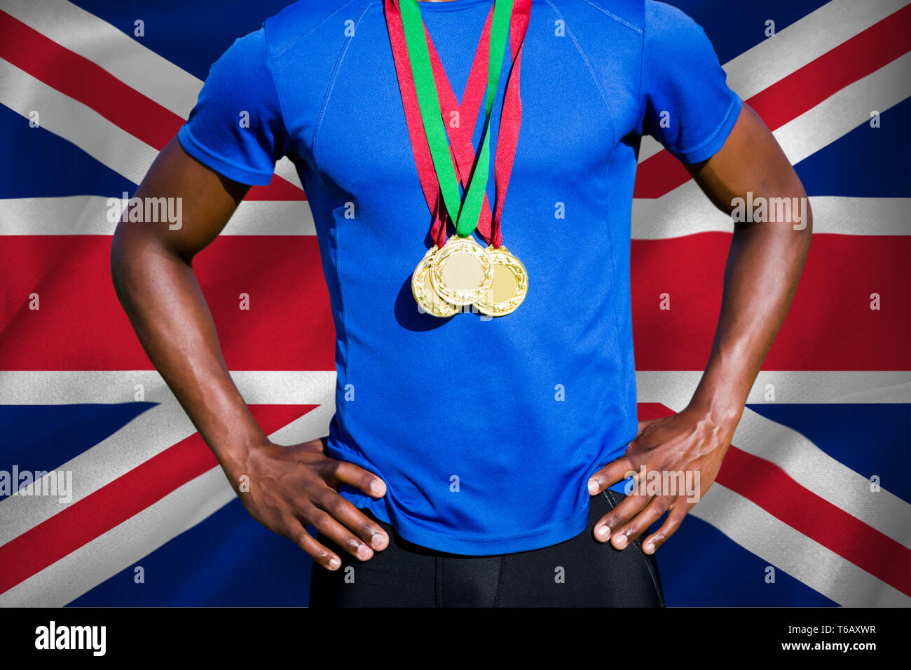 Composite image of portrait of athletic man chest holding gold medals ...