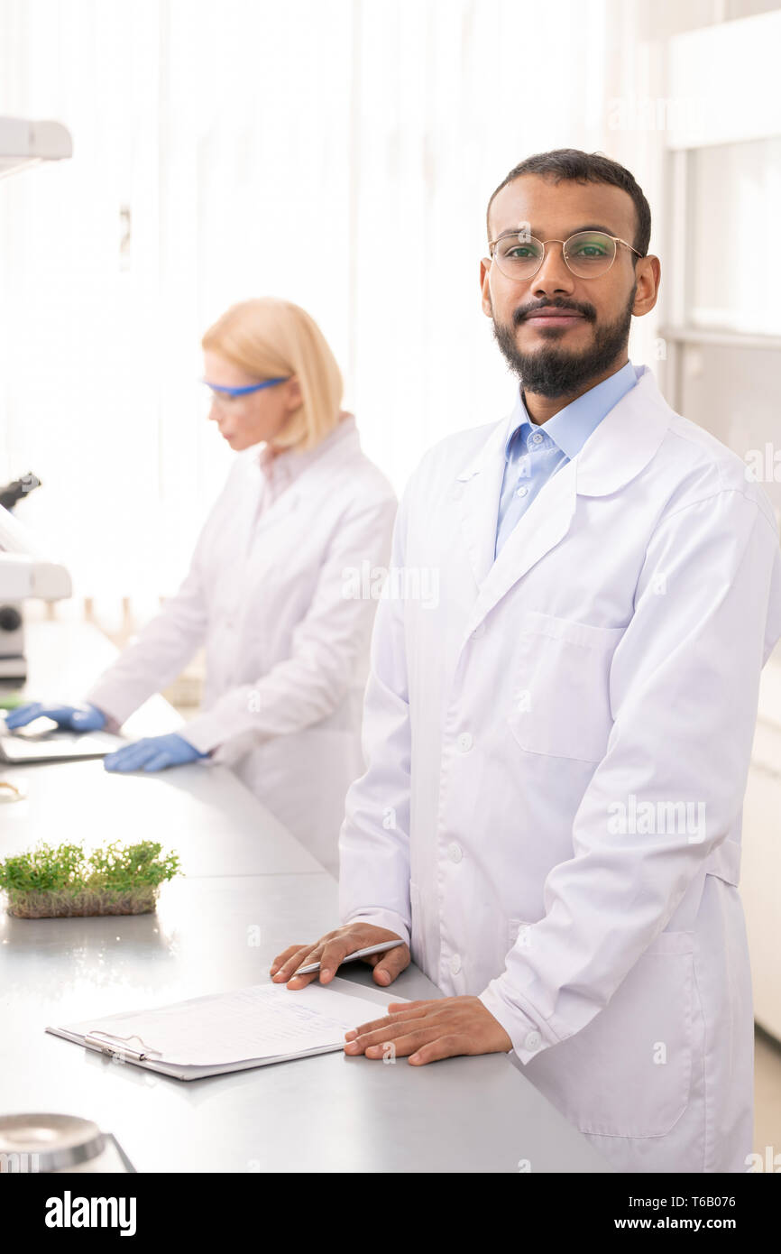 Confident young laboratory scientist Stock Photo - Alamy
