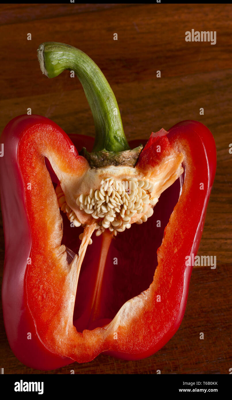 cut red pepper. Visible grains of pepper Stock Photo - Alamy