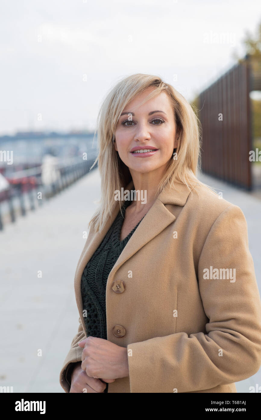 mature woman walking on promenade Stock Photo - Alamy