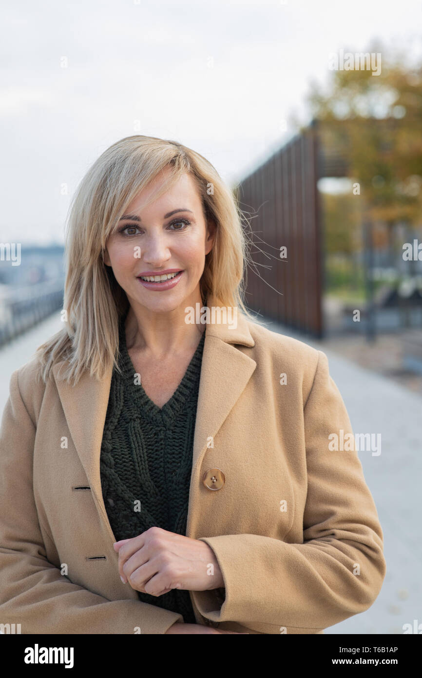 mature woman walking on promenade Stock Photo - Alamy