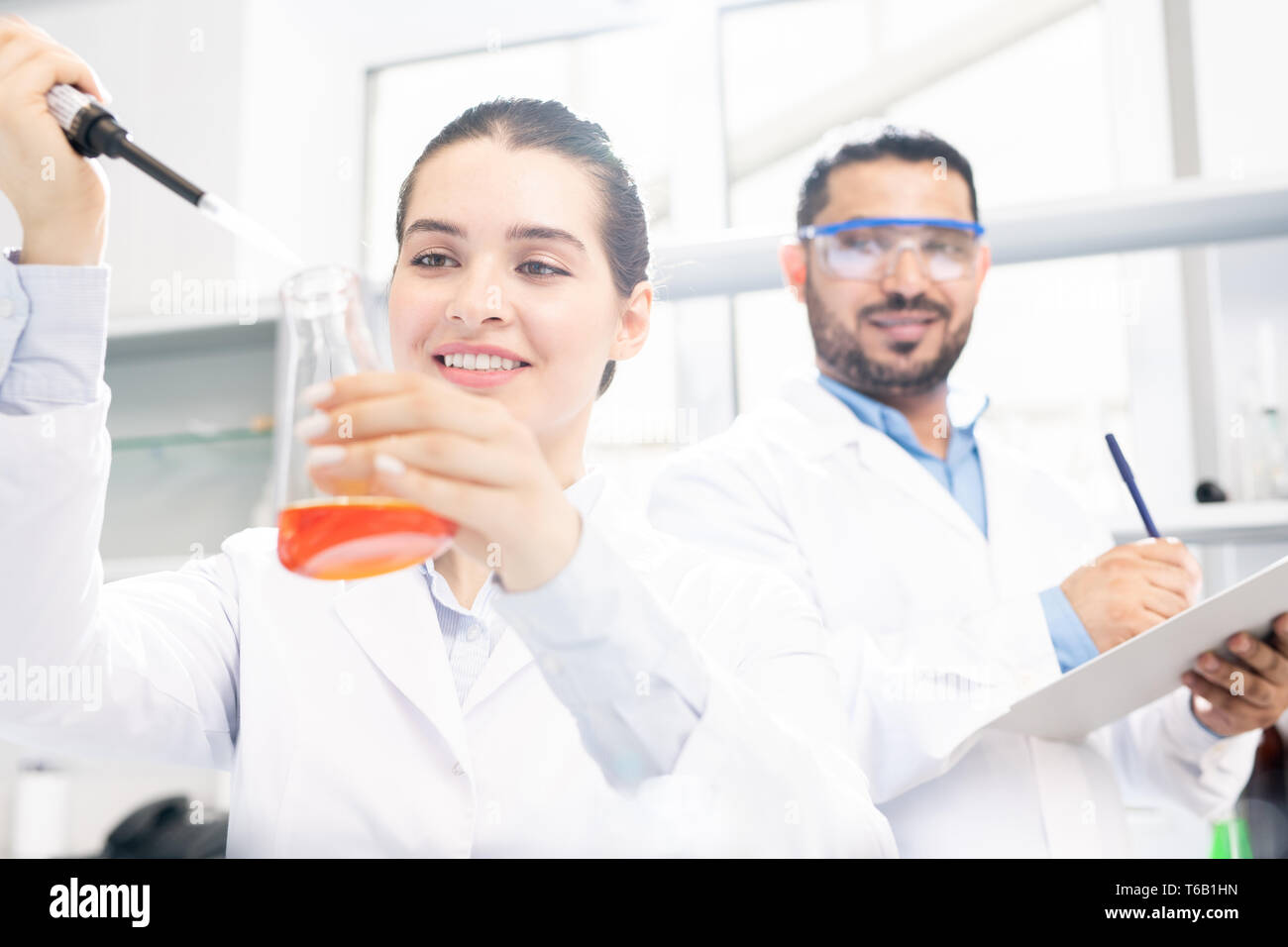 Successful scientific experiment in laboratory Stock Photo - Alamy