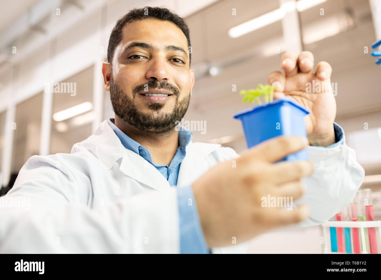 Young scientist man laboratory experiment hi-res stock photography and ...