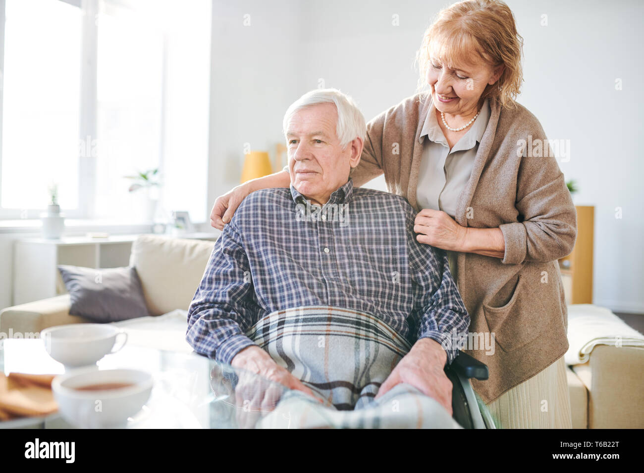 Taking care of husband Stock Photo - Alamy
