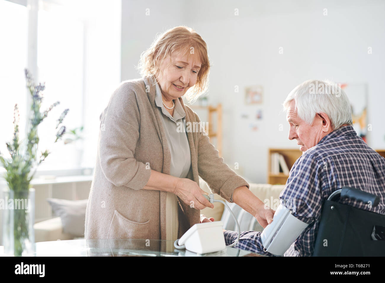Regular blood pressure check-up Stock Photo - Alamy