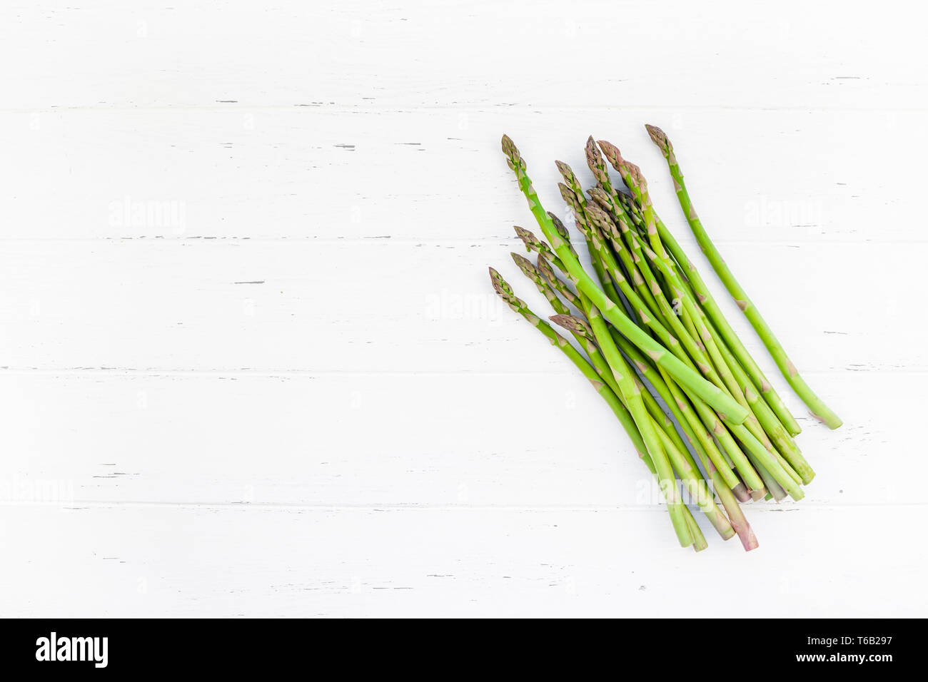 Creative scandinavian style flat lay top view mockup of fresh green ...