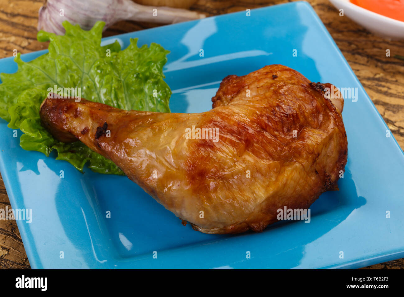 Crispy tasty Roasted chicken leg Stock Photo - Alamy