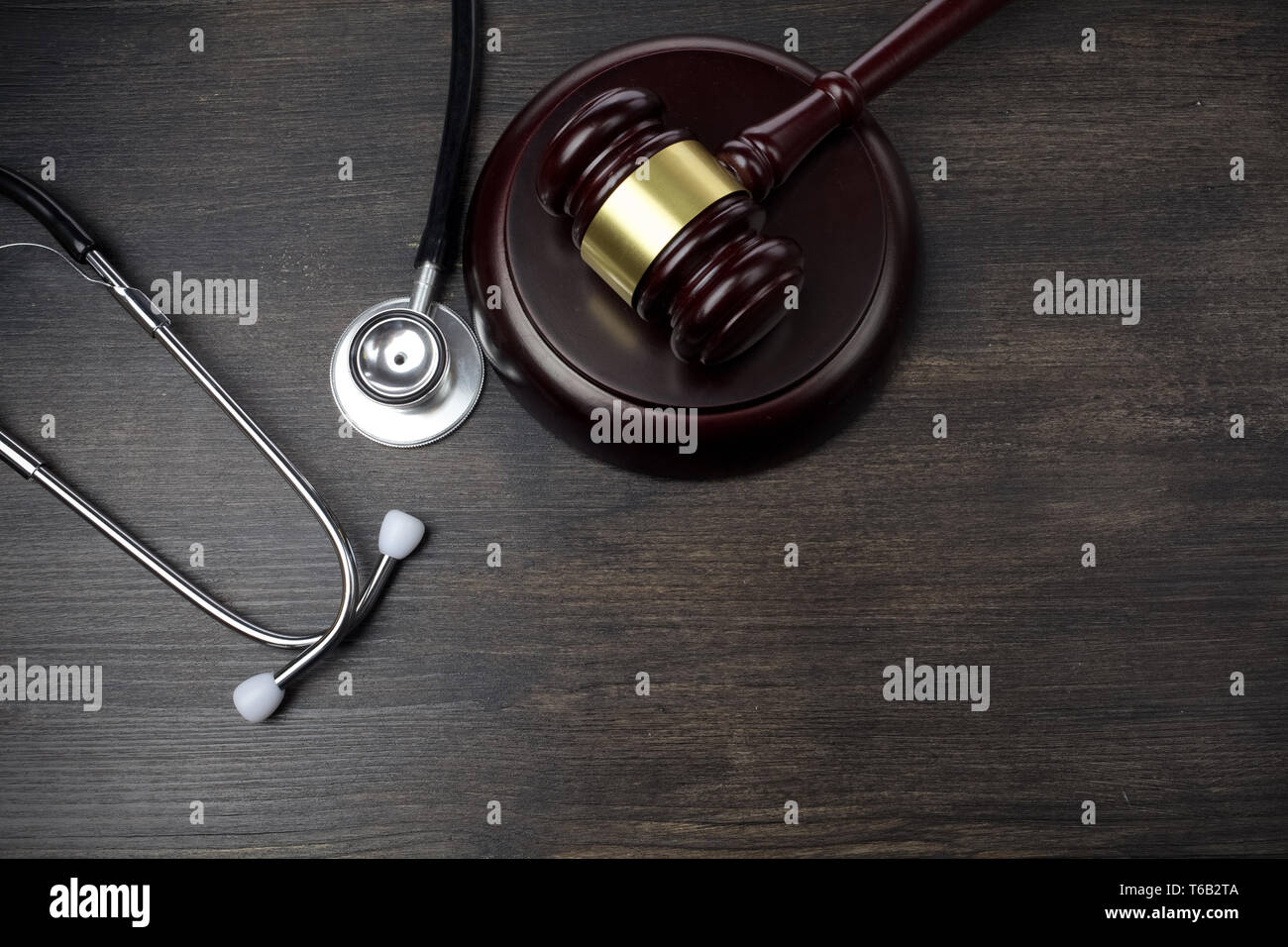 Gavel and stethoscope on black wooden background Stock Photo - Alamy