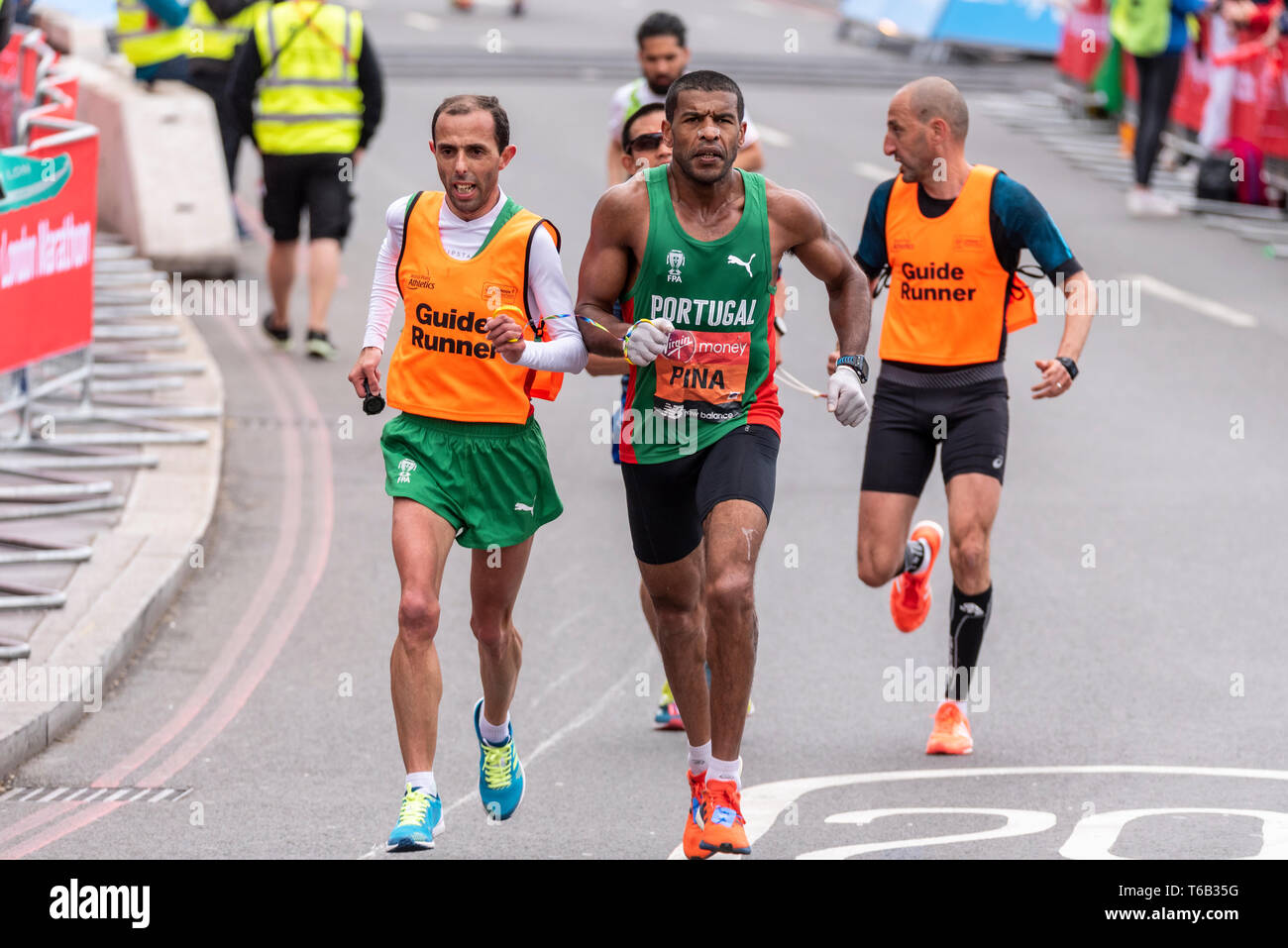 Jorge Pina racing in the Virgin Money London Marathon 2019 near Tower ...
