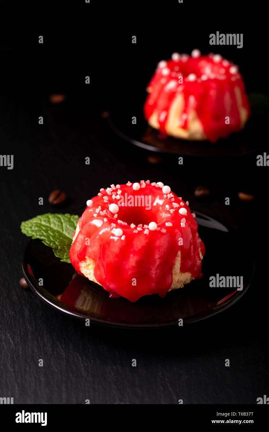 Food bakery concept homemade summer red berry sponge cake on black ...