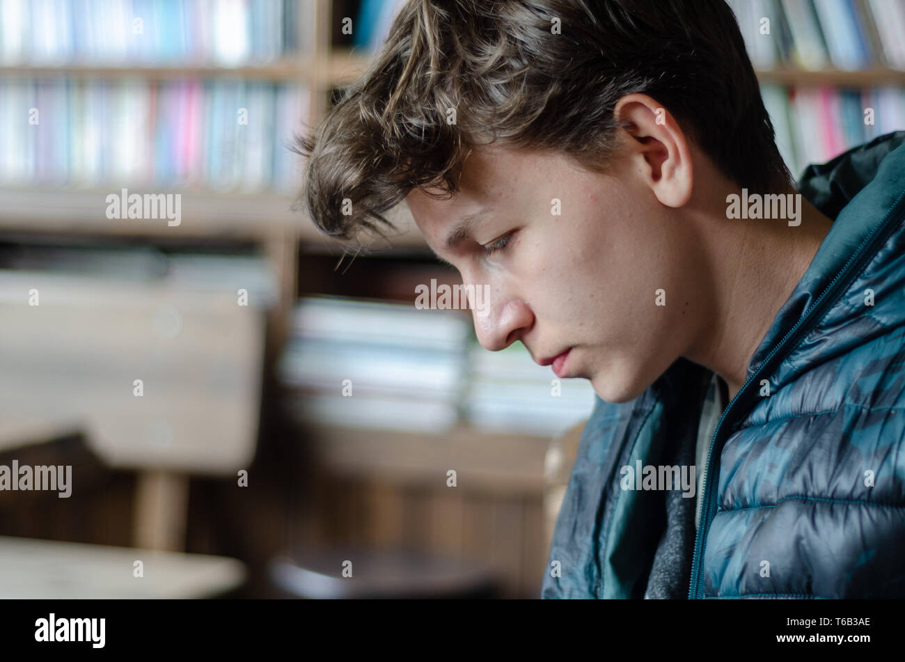 Portrait of a sad, tired,alone teenager. Problems of teenagers, concept ...