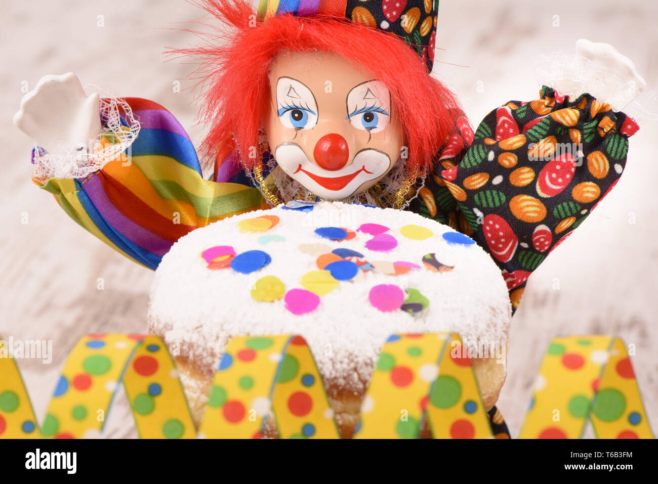 clowns at german carnival with sweet donut Stock Photo - Alamy
